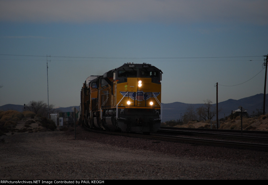 UP 8685 Leads a Mixed Vehicle and Double Stack Train into the BNSF Barstow Complex on Her way to ...